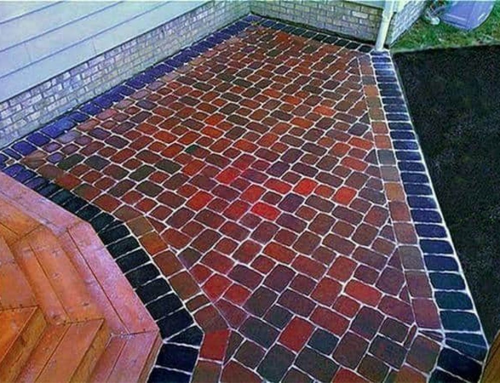 A drone view of a canyon colored paver patio with 2 custom steps ...